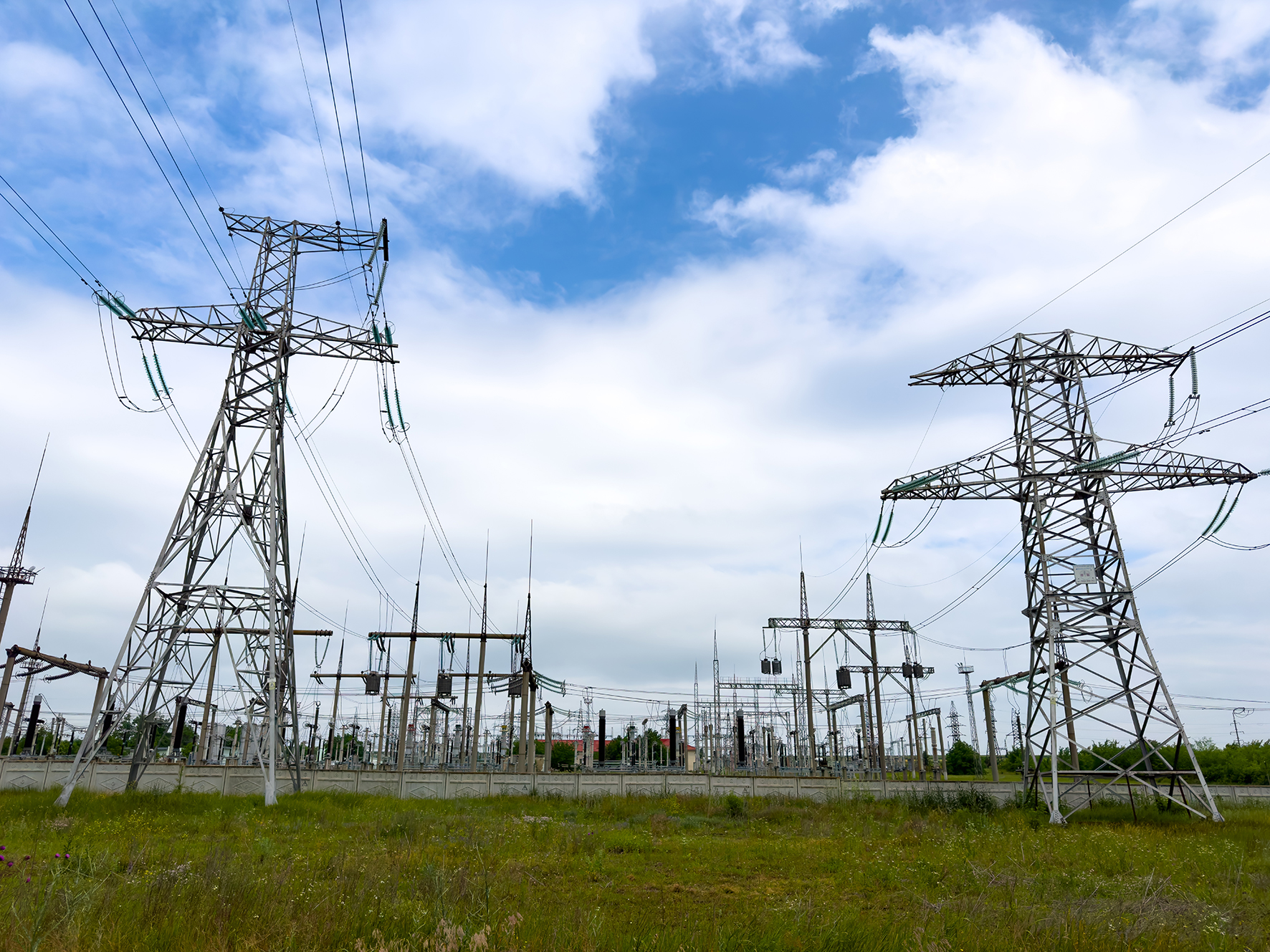 Power,Transmission,Towers,In,A,Power,Plant - Power Line Magazine